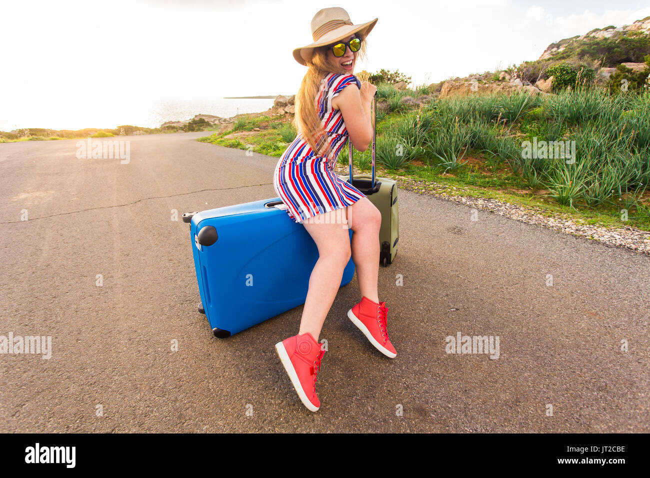 Happy Traveler Woman With Suitcase On The Beach Concept Of Travel