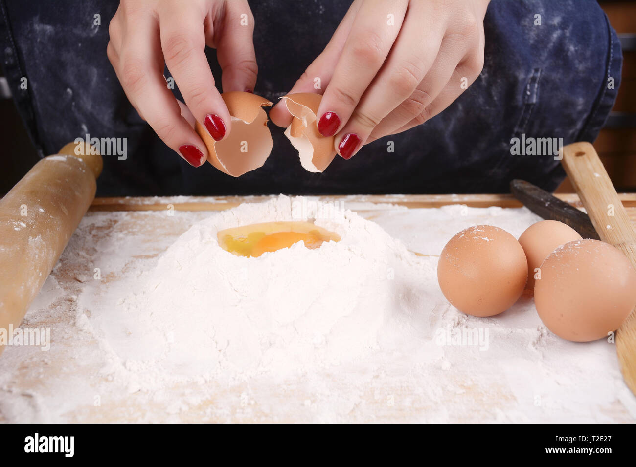 Human hand breaking egg hi-res stock photography and images - Alamy