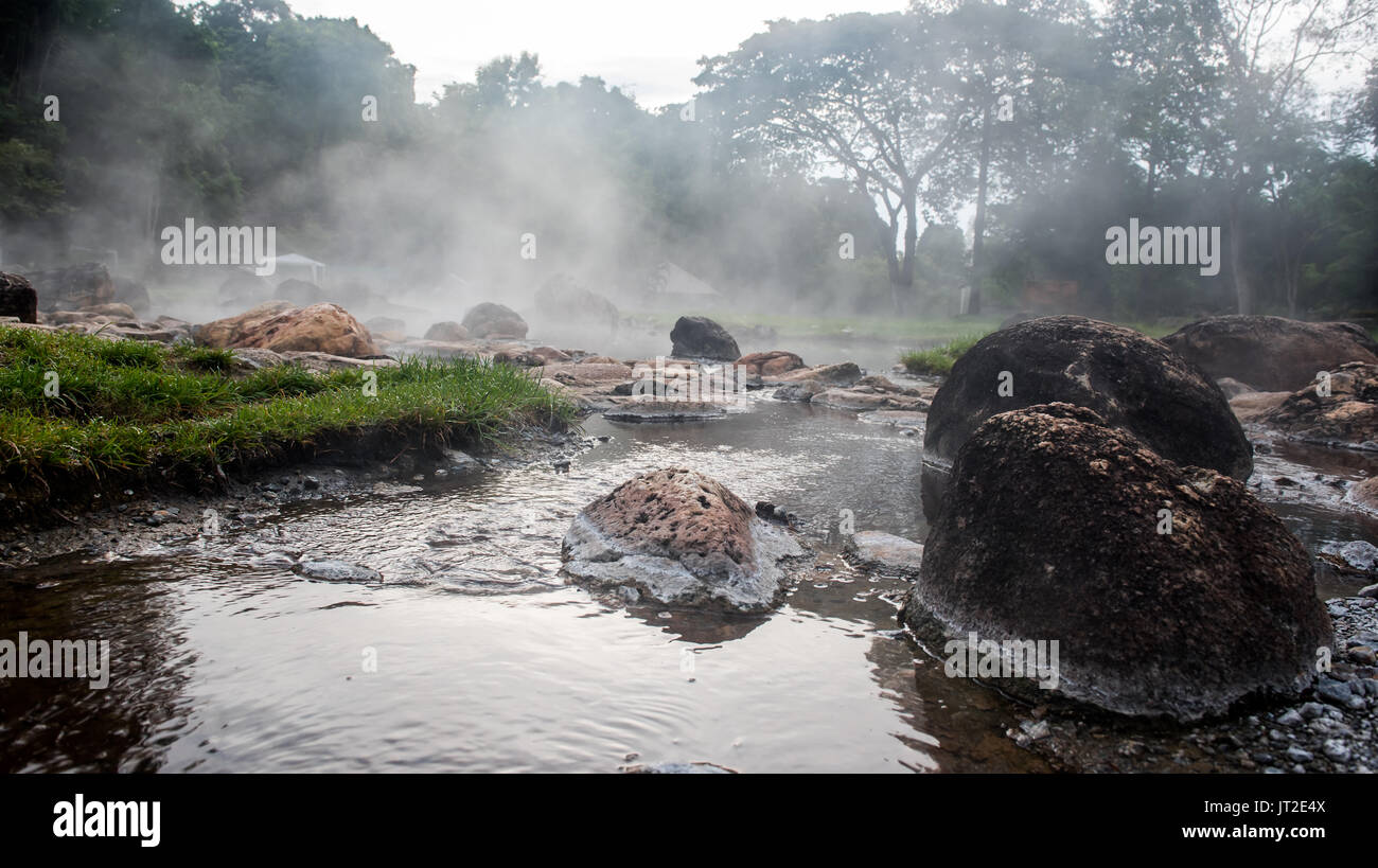 Boil egg in the mineral pool and natural hot water Stock Photo - Alamy