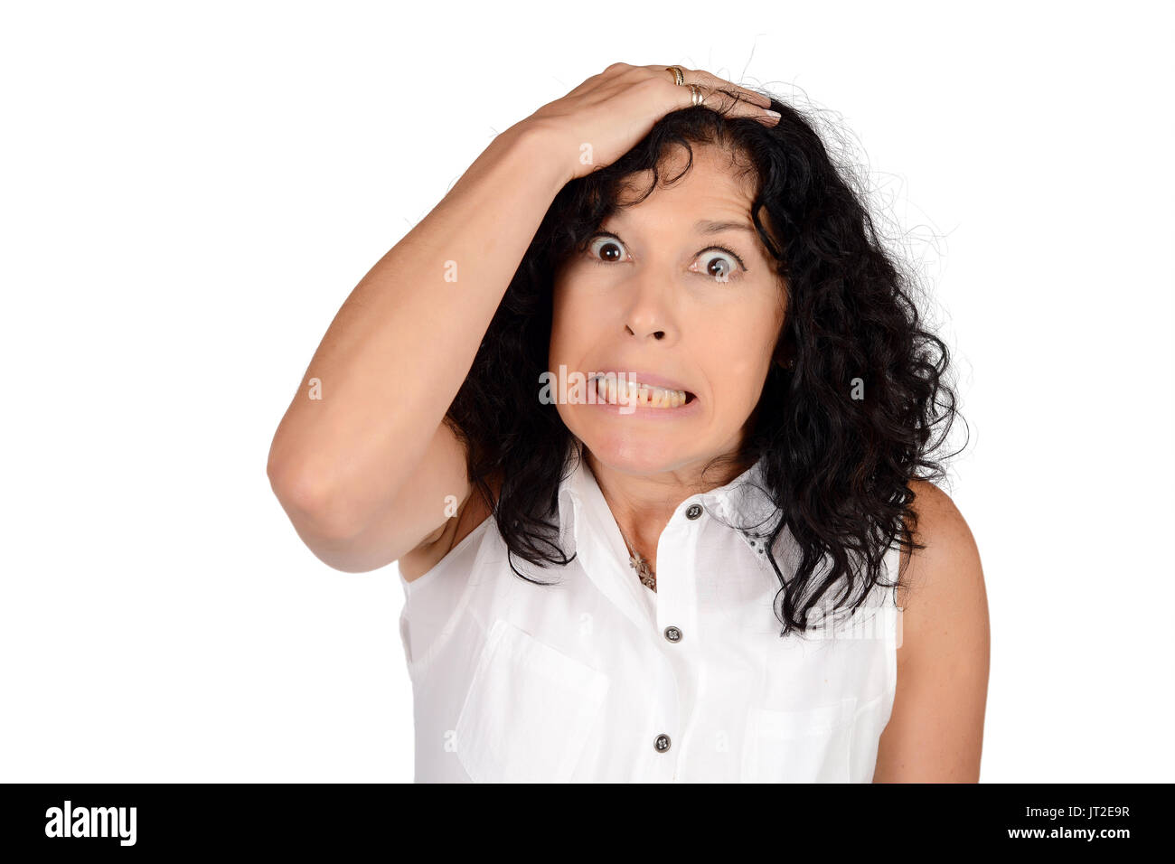 Portrait of a worried woman. Isolated white background Stock Photo - Alamy