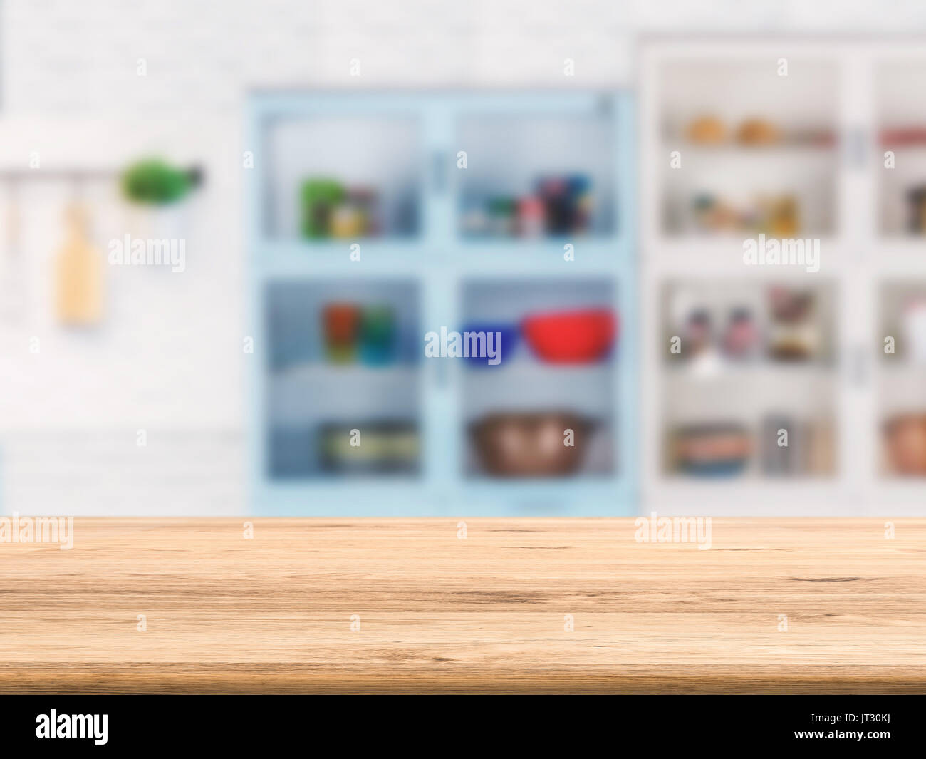 wooden counter top with kitchen cabinet background Stock Photo - Alamy