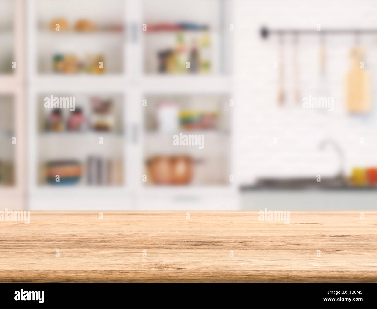 wooden counter top with kitchen cabinet background Stock Photo - Alamy