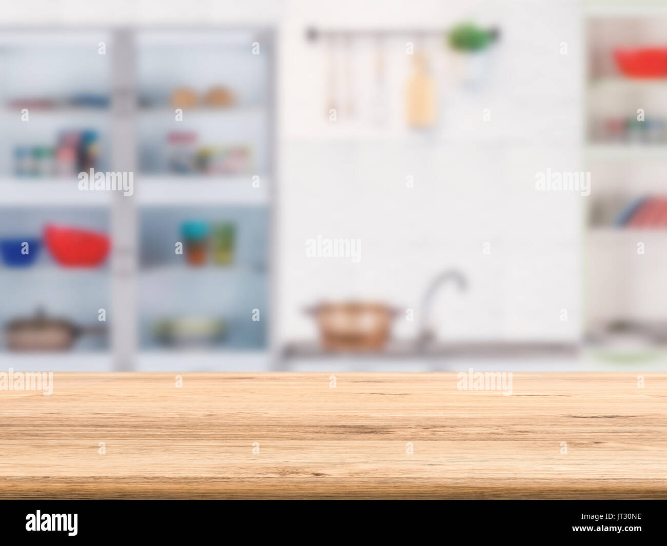 wooden counter top with kitchen cabinet background Stock Photo - Alamy
