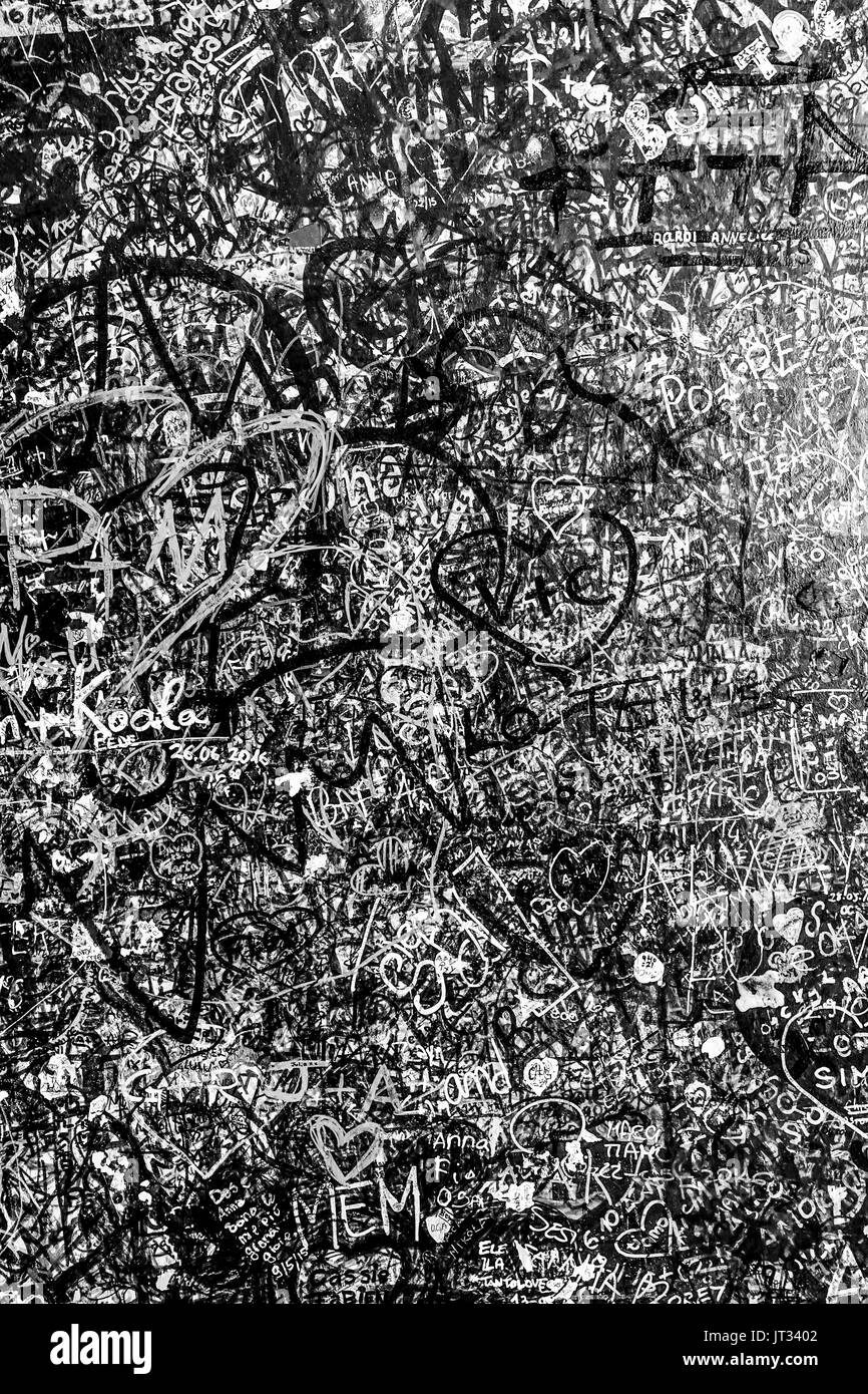 Awesome wall totally covered with love proof graffiti at Juliets house ...
