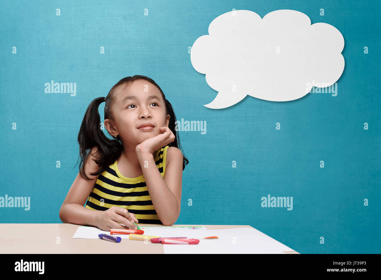 Beautiful asian child think for new idea with white cloud on the ...
