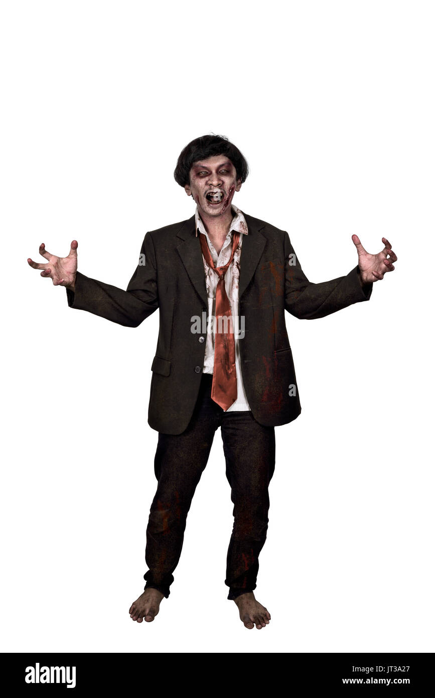 Portrait of asian zombie man in a suit standing isolated over white ...