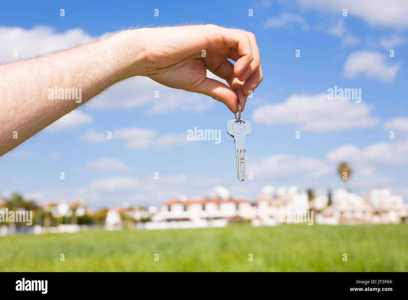 Key in hand for new home and real estate. Concept of housewarming ...
