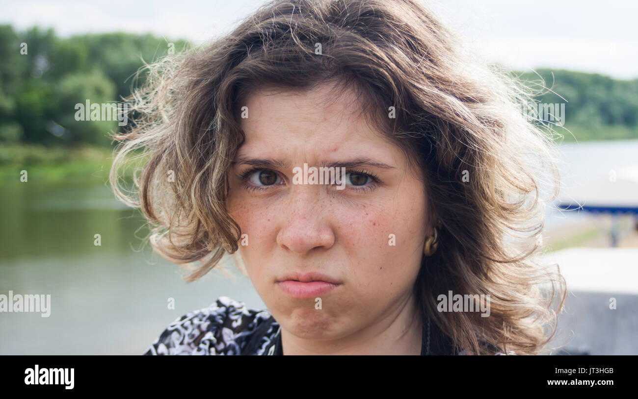 Portrait of a beautiful woman thinking and looking sad Stock Photo - Alamy