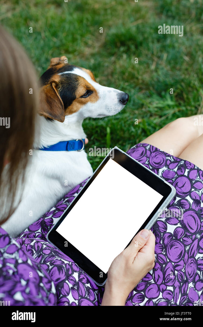 Using tablet outdoor rear view hi-res stock photography and images - Alamy