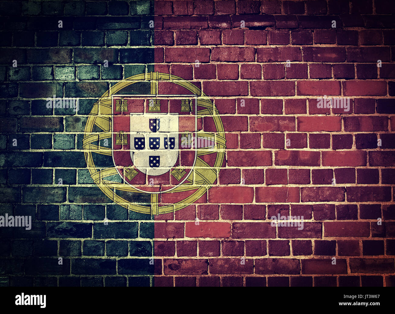 Faded Portuguese flag on an old brick wall background with a dark ...