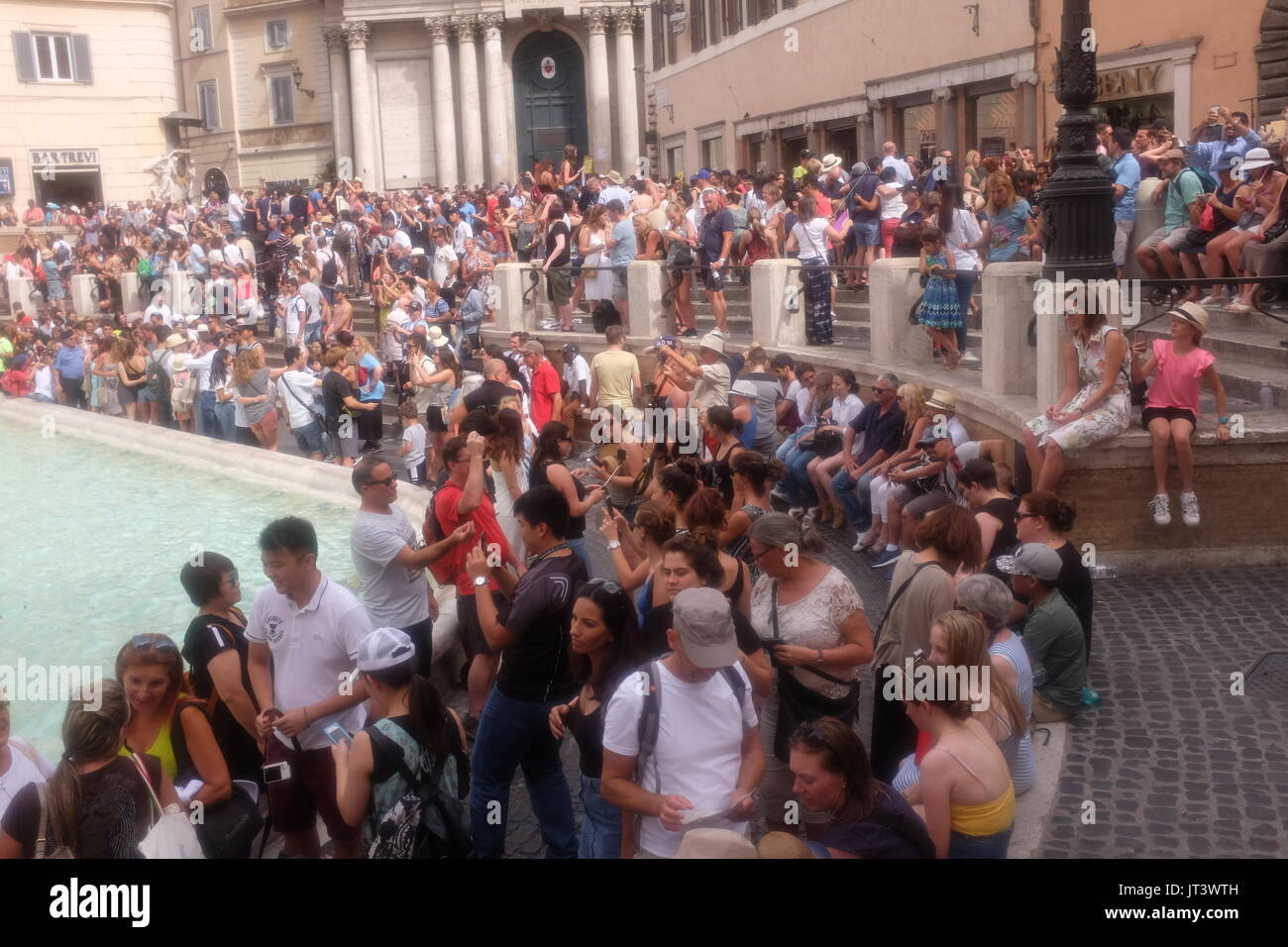 Rome Italy July 2017 - Tourists crowd around the Trevi Fountain ...
