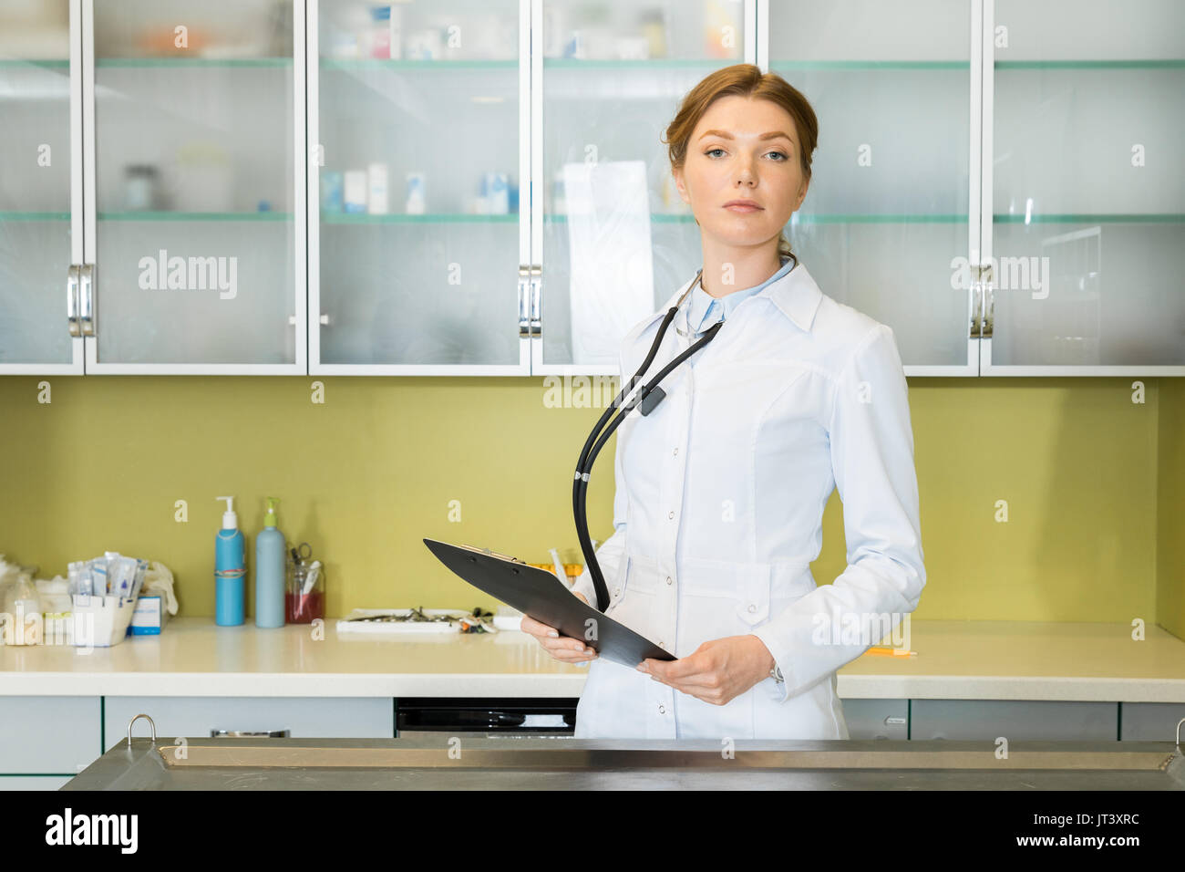 Young confident female doctor at clinic Stock Photo - Alamy