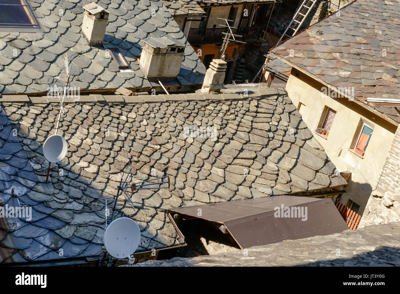 detail of traditional slate roofs of medieval mountain village, shot on ...