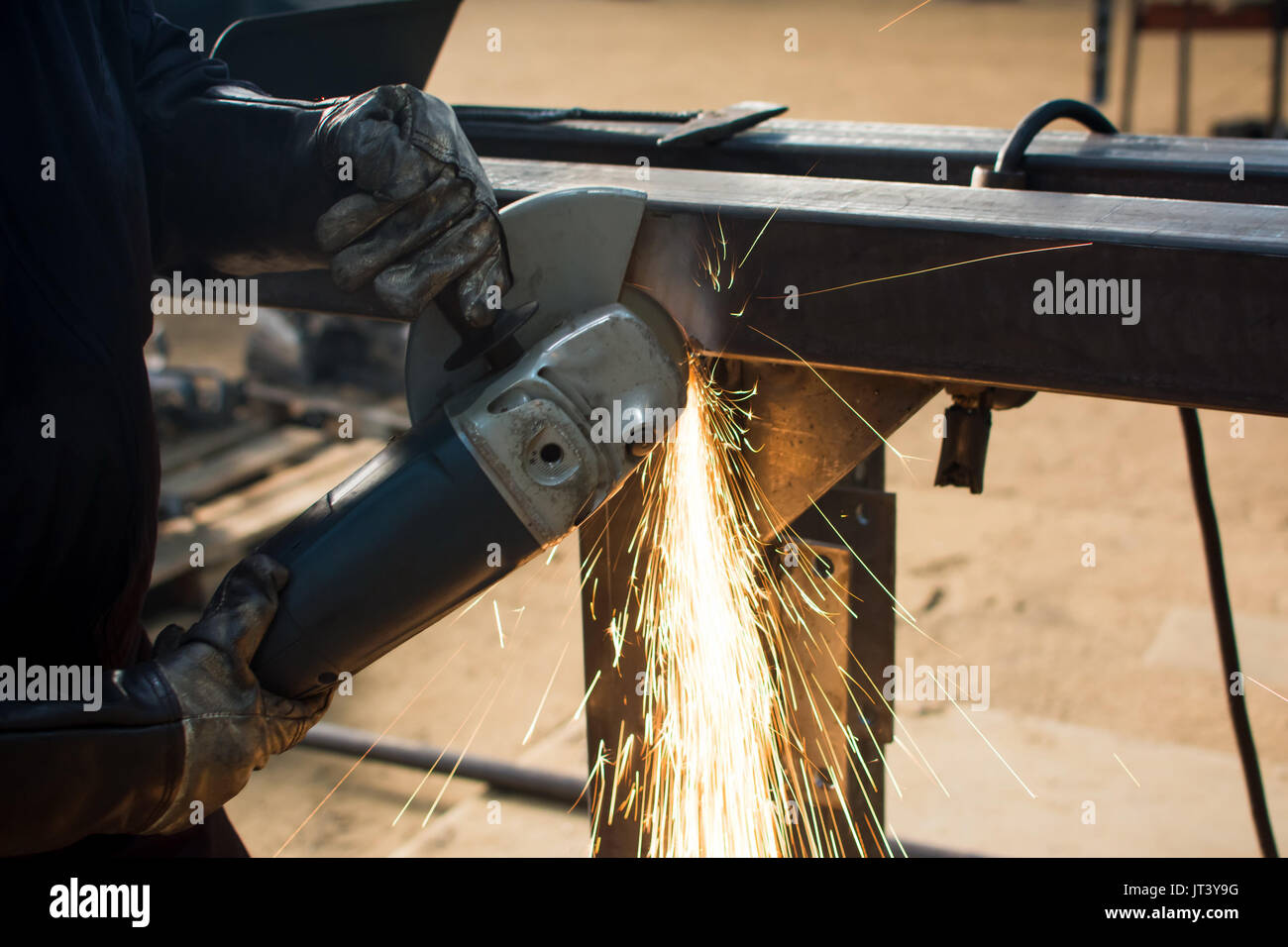 Man using grinding machine hi-res stock photography and images - Alamy