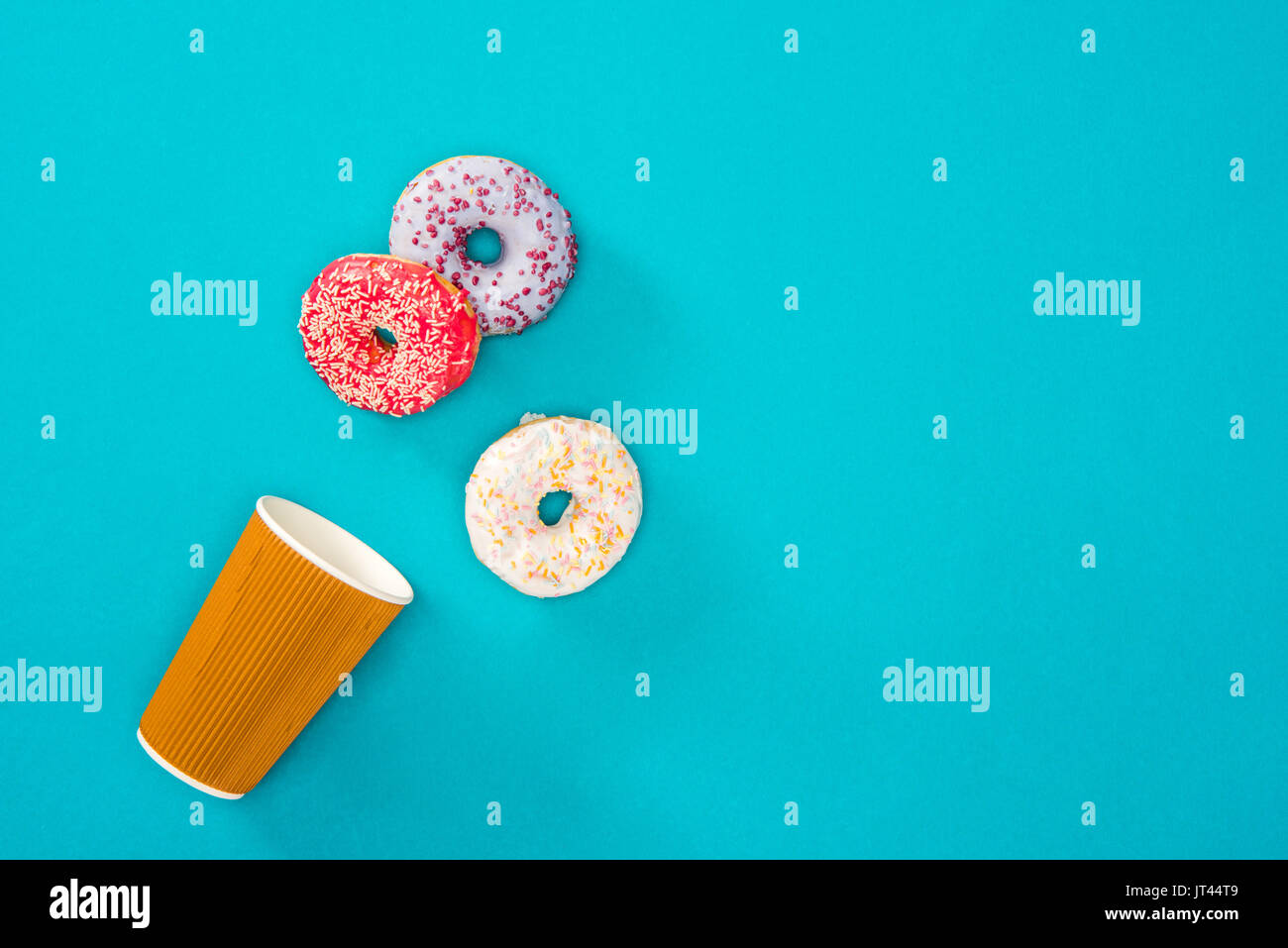 Overhead view of scattered donuts with various glaze. sweet donuts ...