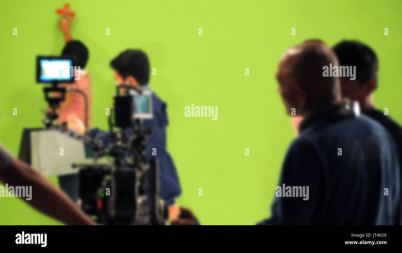 Blurred behind the scenes of video movie production in big studio with ...