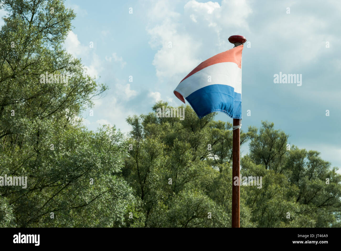 Netherlands waving flag bright hi-res stock photography and images - Alamy