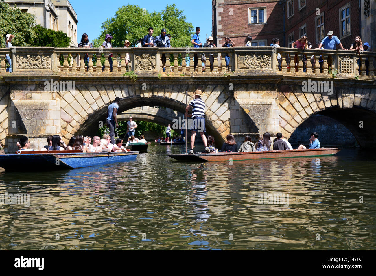 Punt boat traffic jam at St Johns College Kitchen bridge on the River Cam in Cambridge England ...