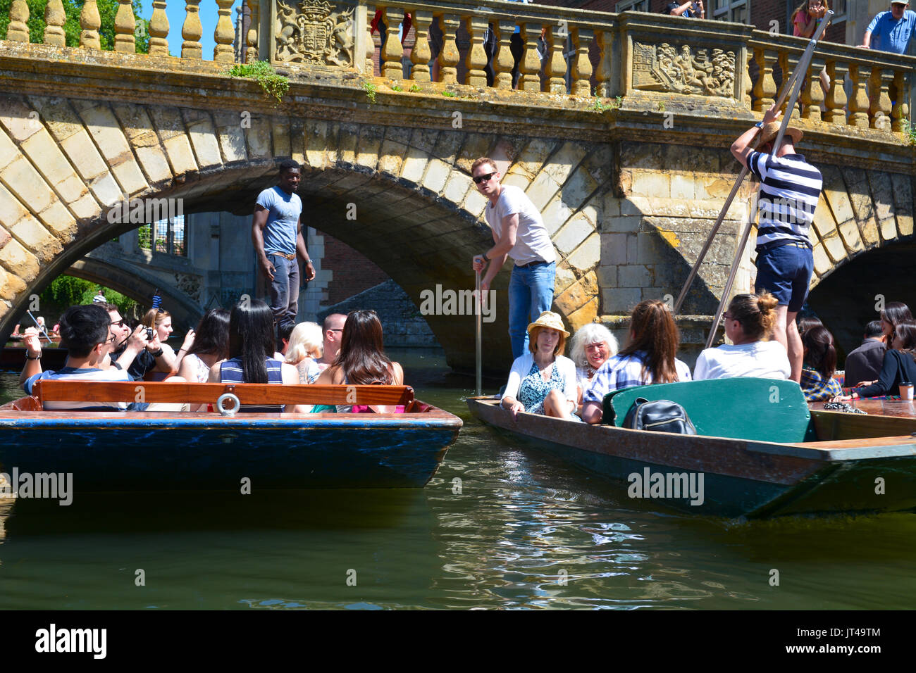Punt boat traffic jam at St Johns College Kitchen bridge on the River Cam in Cambridge England ...