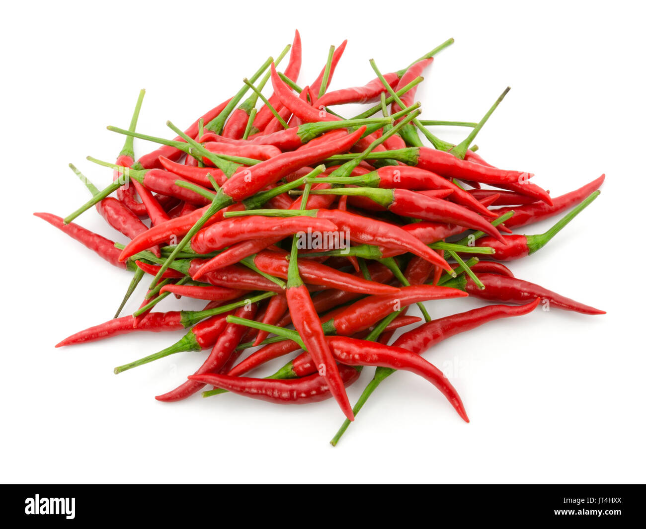 Stack of hot chili pepper or small chili padi, isolated on white ...