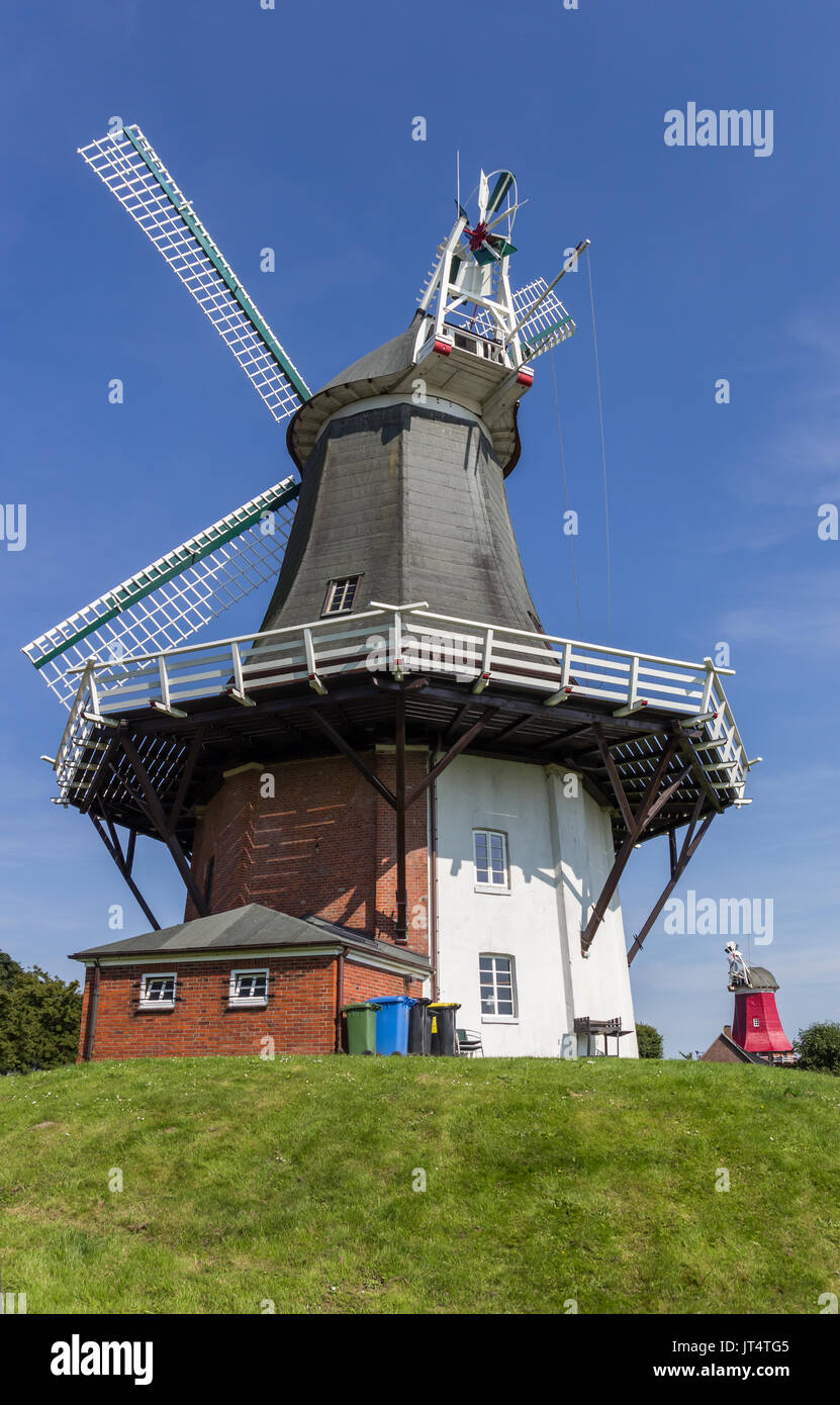 Windmills in the historic center of Greetsiel, Germany Stock Photo - Alamy