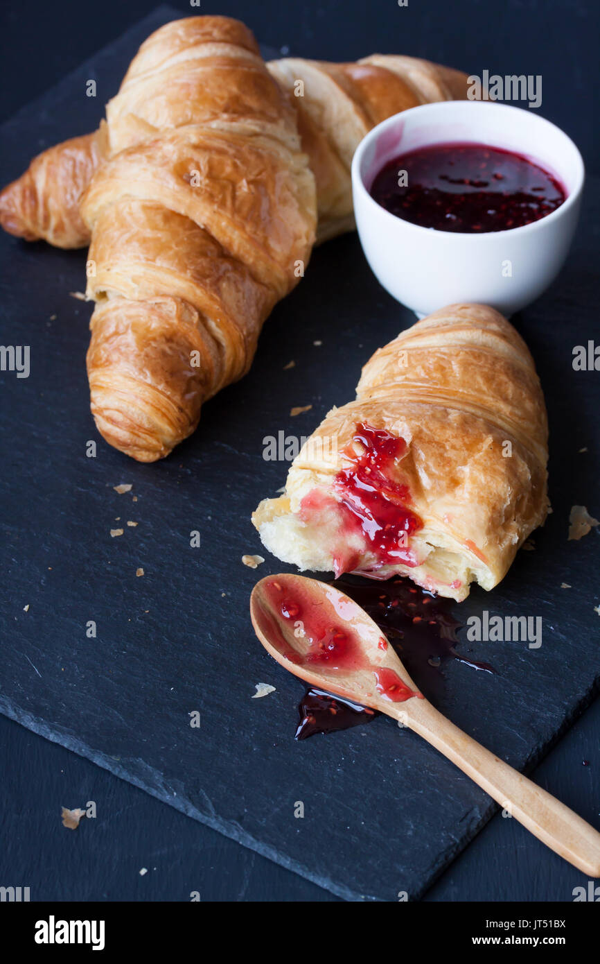 Croissant and raspberry jam Stock Photo - Alamy