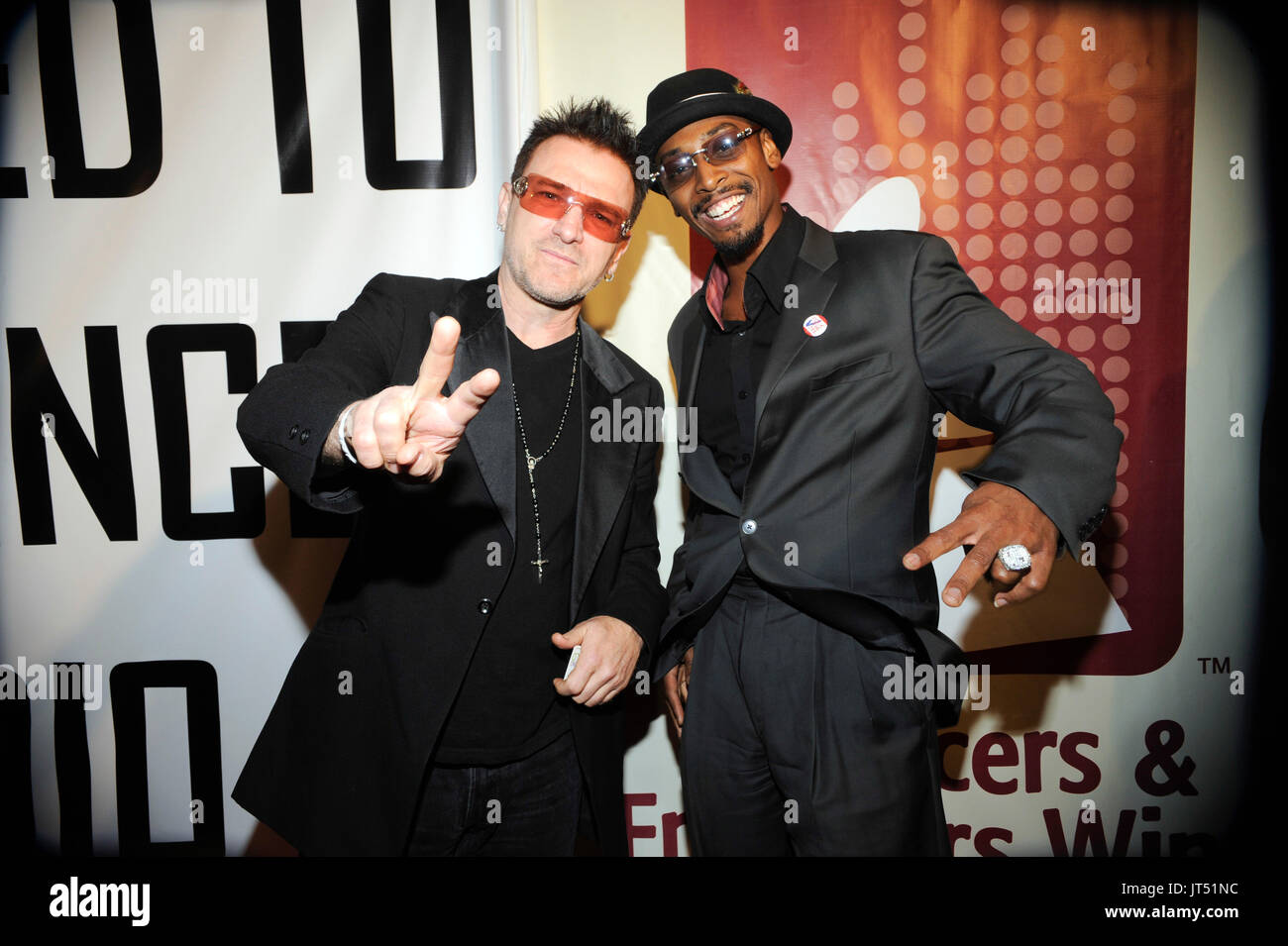 (L-R) U2 Bono impersonator 2Pac impersonator Darris Love arrives ...