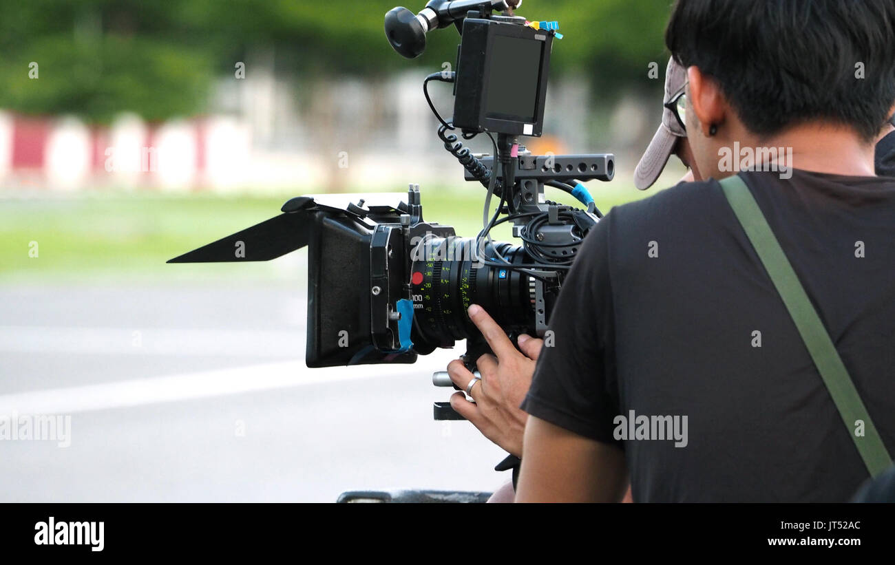 Behind the scenes of movie shooting or video production and film crew ...