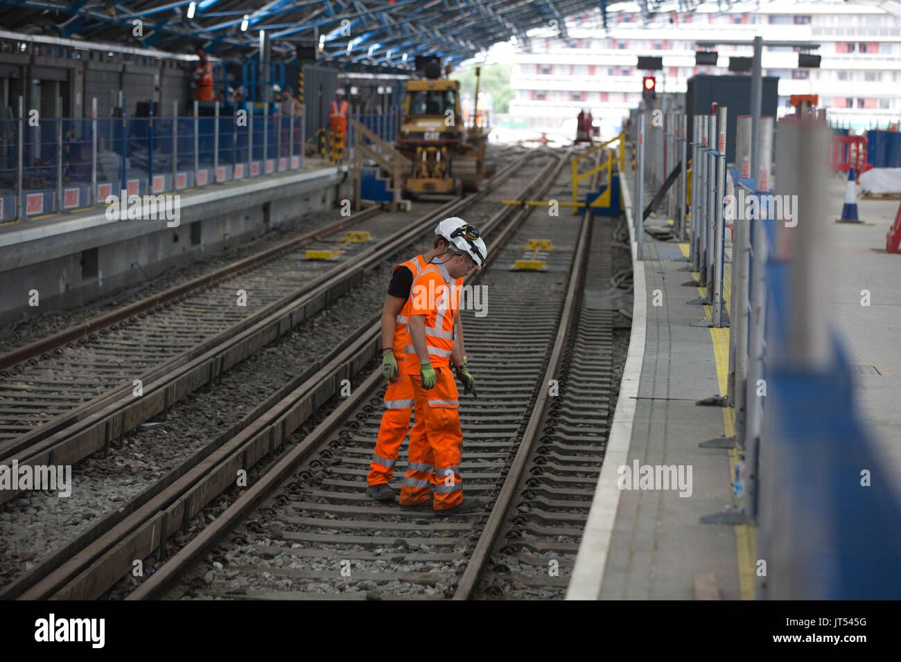 Network Rail workers maintaining the track at London Waterloo Station ...