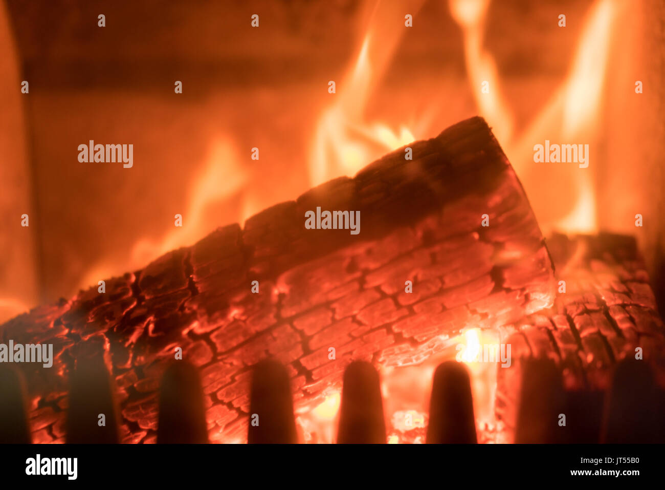 Burning oak branches in wood fireplace Stock Photo - Alamy