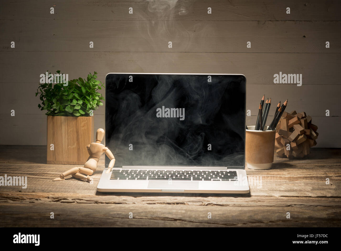 The front view of notebook and wooden doll. Inspiration and mock-up ...