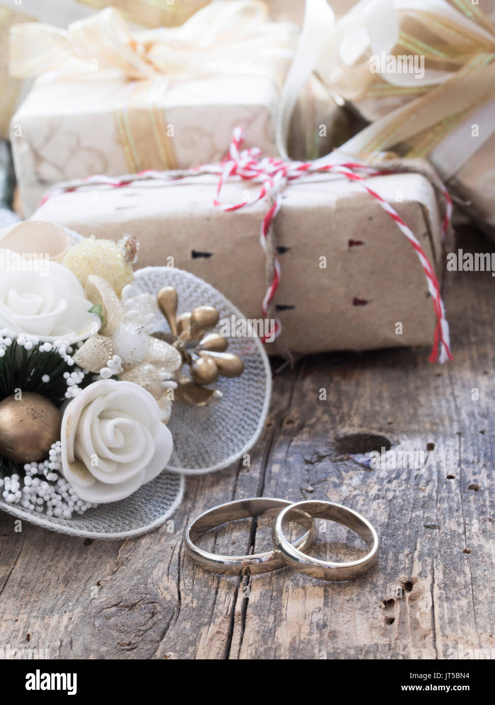 golden wedding rings in decorative arrangement Stock Photo - Alamy