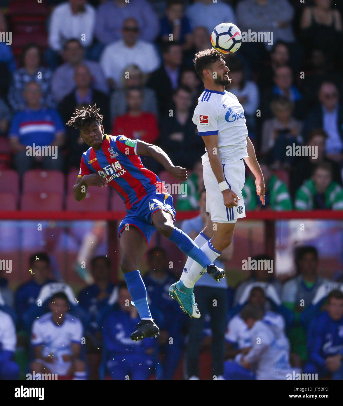 Schalke's Daniel Caligiuri and Crystal Palace's Jason Lokilo during the ...