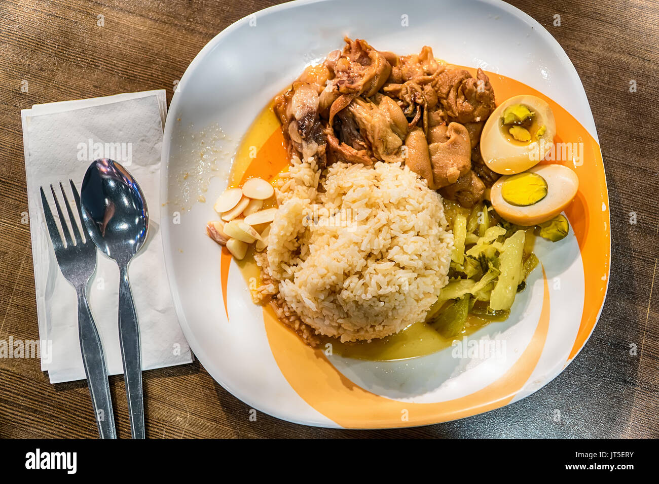 Stewed pork leg over rice Stock Photo - Alamy