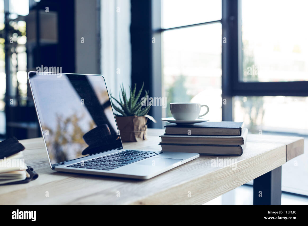 design of workplace with laptop and cup of cofffee in home office Stock ...