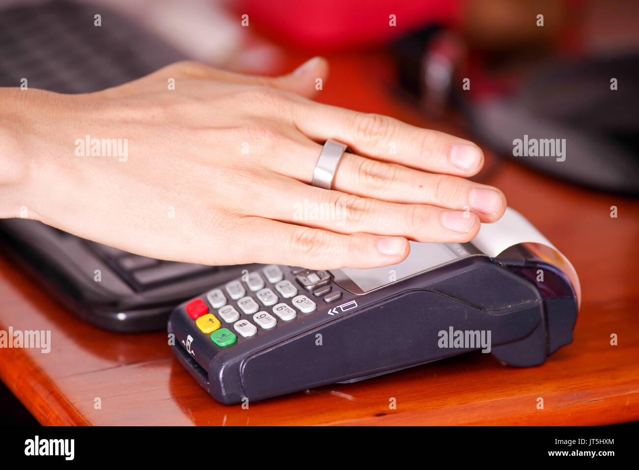 Modern payment with new technology of payments using a smart ring, buy ...