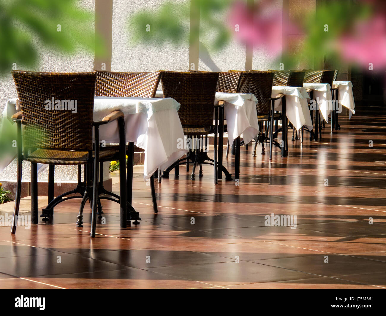 close up shot of outdoor empty restaurant table and chairs Stock Photo ...