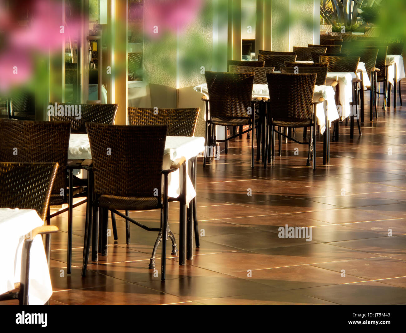 close up shot of outdoor empty restaurant table and chairs Stock Photo ...
