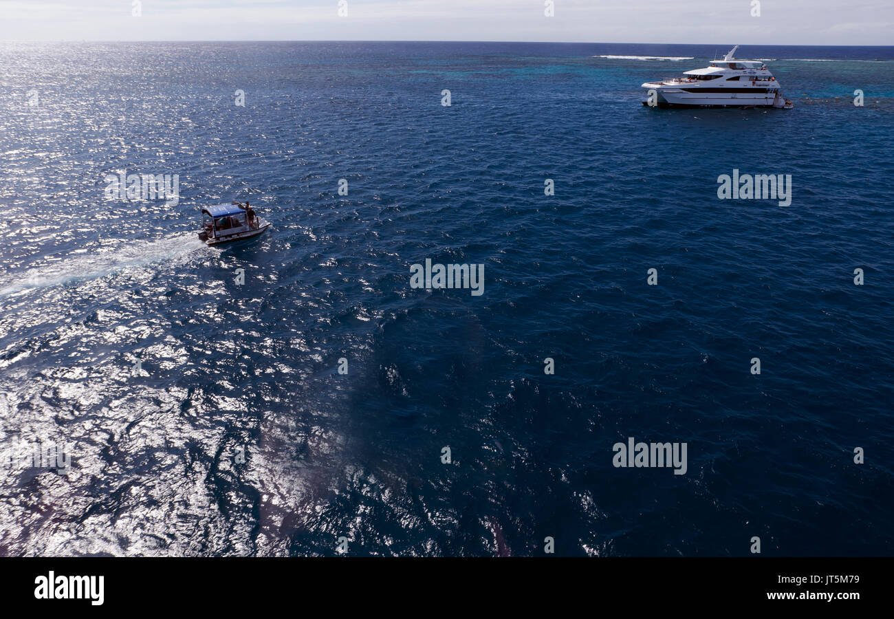 Aerial view of the Evolution Catamaran and shuttle boat, operated by ...