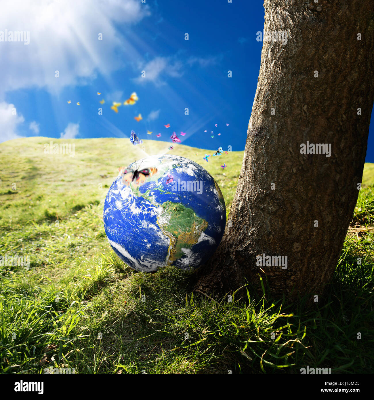 conceptual image of world on green landscape. NASA world map image ...