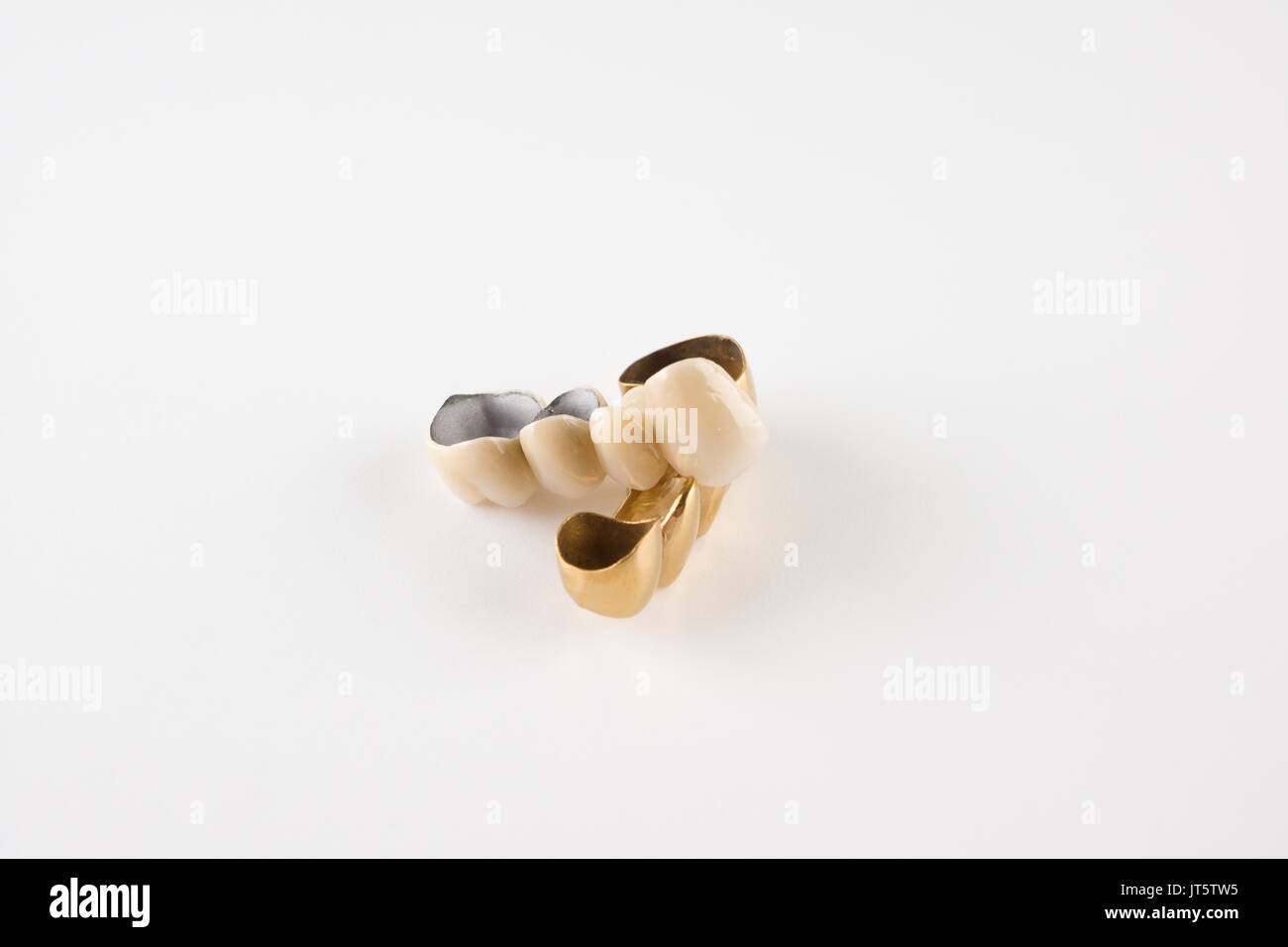 Artificial teeth made of steel with a coating of titanium nitride Stock ...