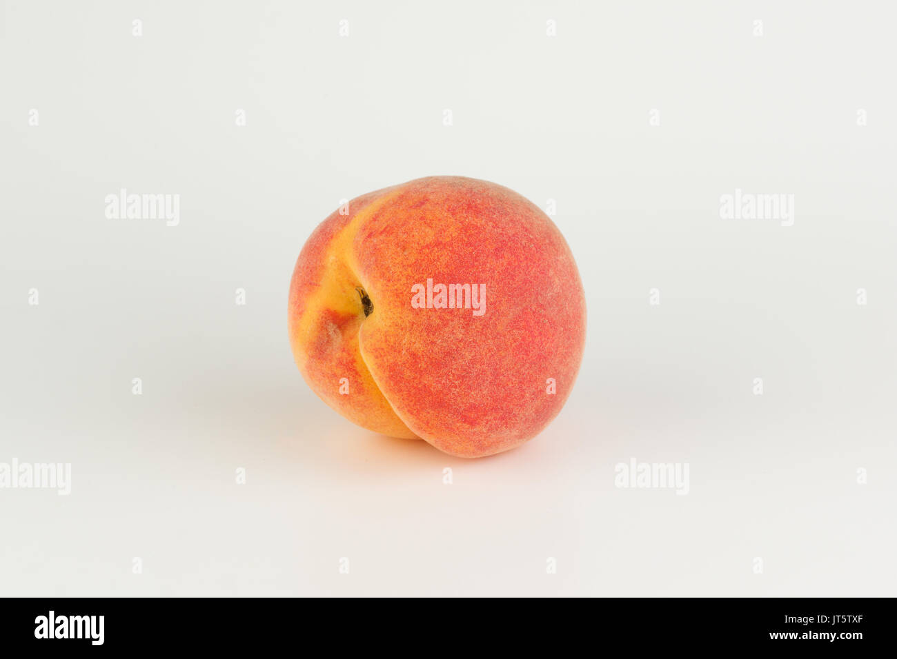Large fresh peach isolated on white background Stock Photo - Alamy
