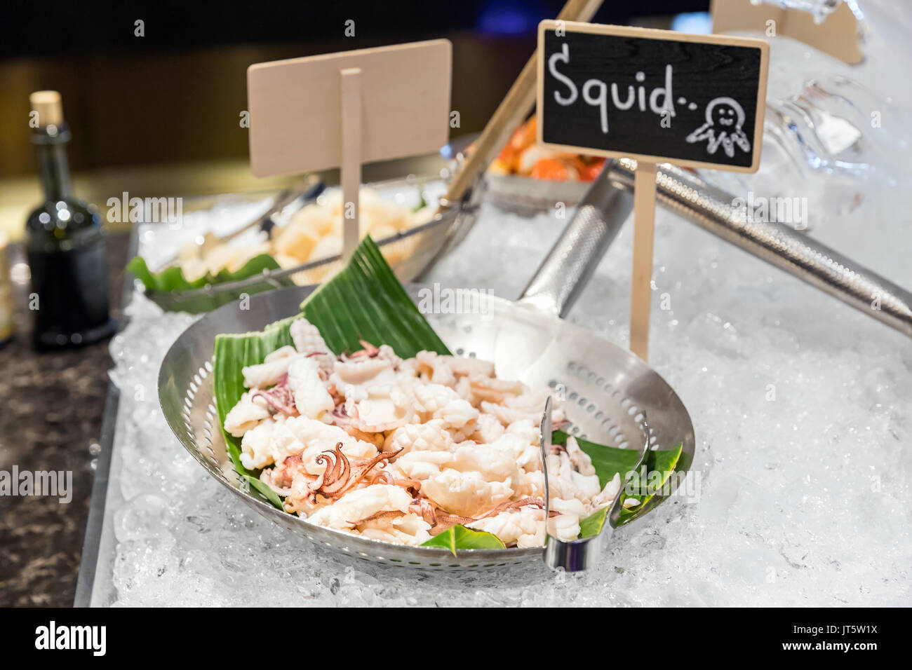 Squid cuttlefish seafood on ice Stock Photo - Alamy