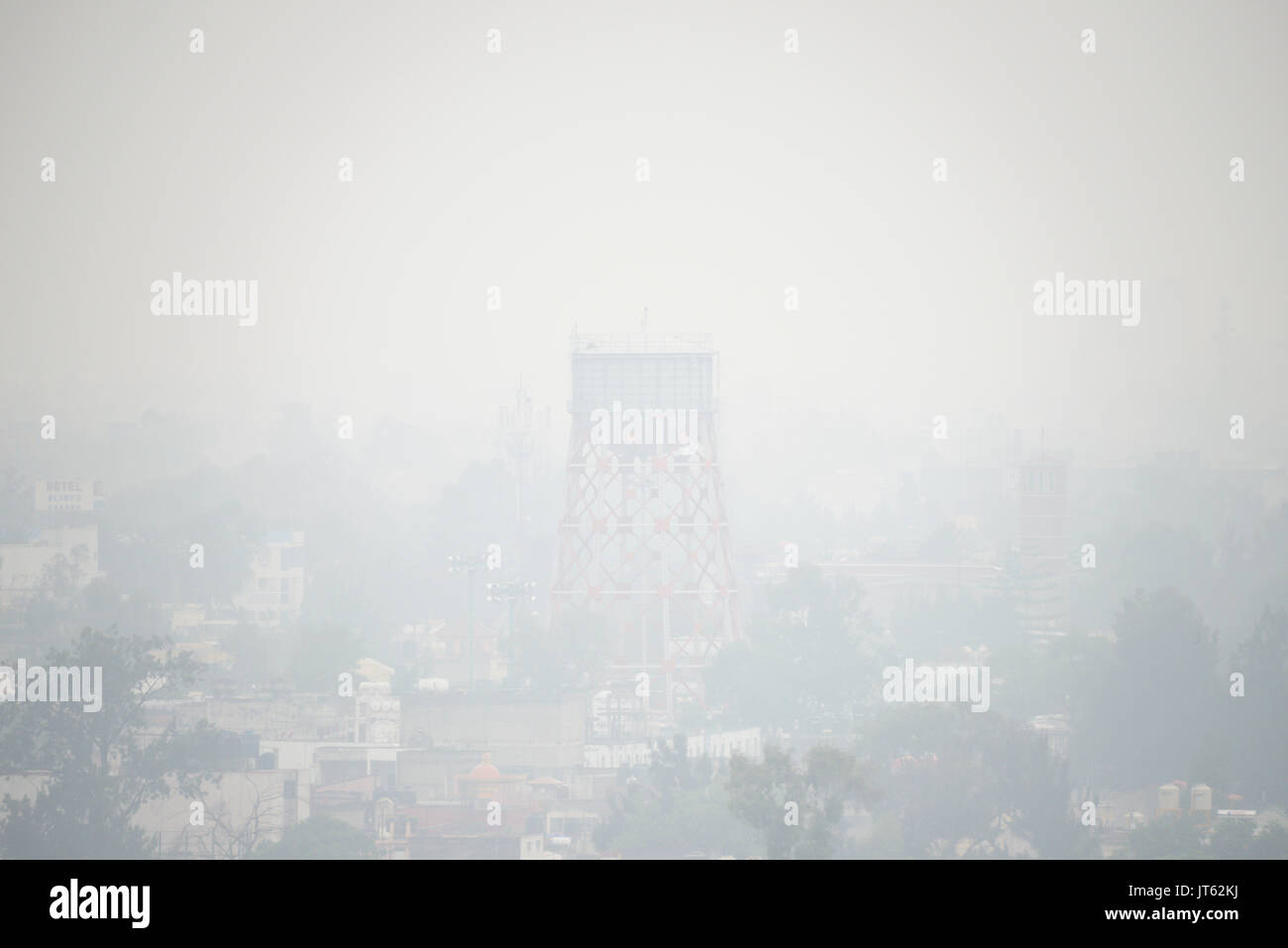 limited visibility on a smoggy day in Mexico City Stock Photo - Alamy