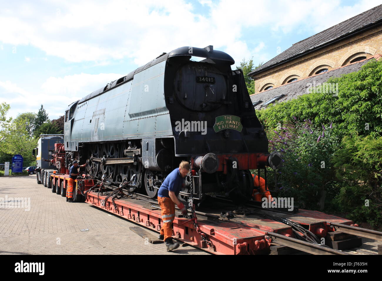 Steam Engine on a Low Loader Stock Photo - Alamy