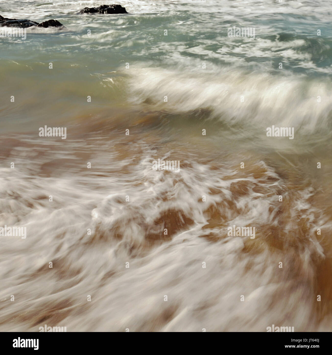 Wave beach captured slow hi-res stock photography and images - Alamy
