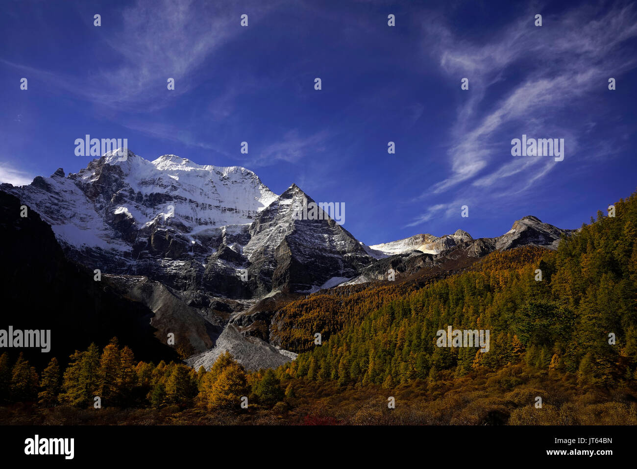 Shangri la, a panorama view of holy snow-clad mountain Chenrezig and ...
