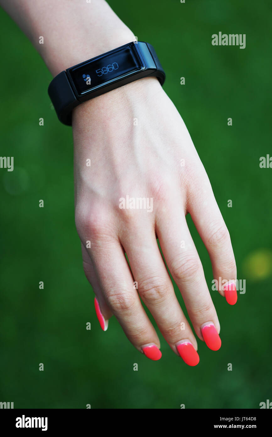 Woman jogging activity tracker hi-res stock photography and images - Alamy