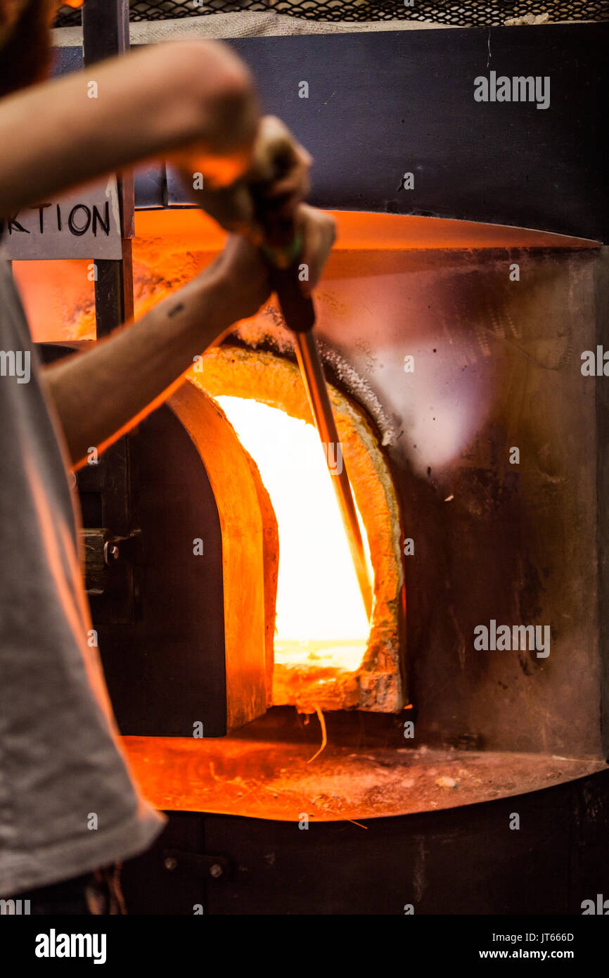 Glassmaker Picking Melted Piece of Glass in the Furnace Stove with ...