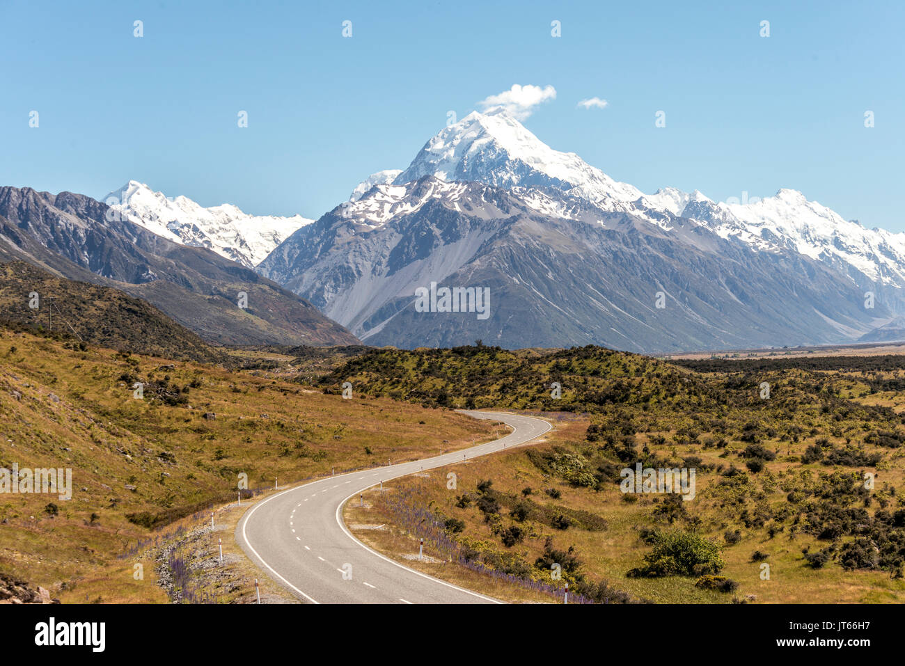 Curvy road with view to Mount Cook, snow covered mountains, Mount Cook ...